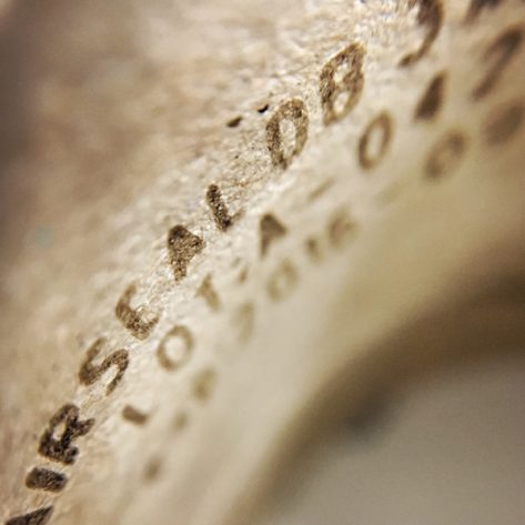 Laser marking inside Cardboard Cores | Arca Labeling & Marking